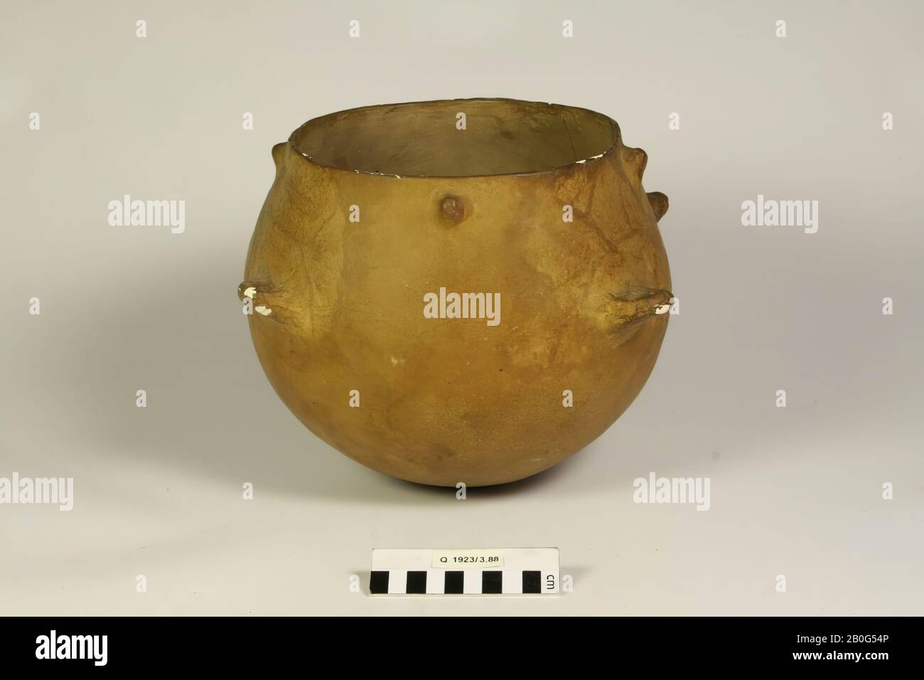 Pot with 8 protrusions (4 large and 4 small). Has ever been broken in ...