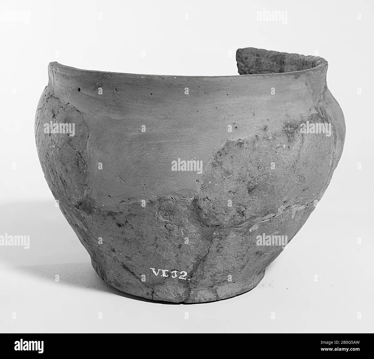 Urn of brown earthenware, hand-worked and hard-baked, broken into 34 ...
