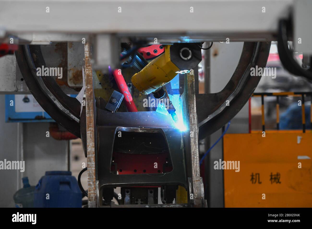 Changsha, China's Hunan Province. 20th Feb, 2020. A welding robot is ...
