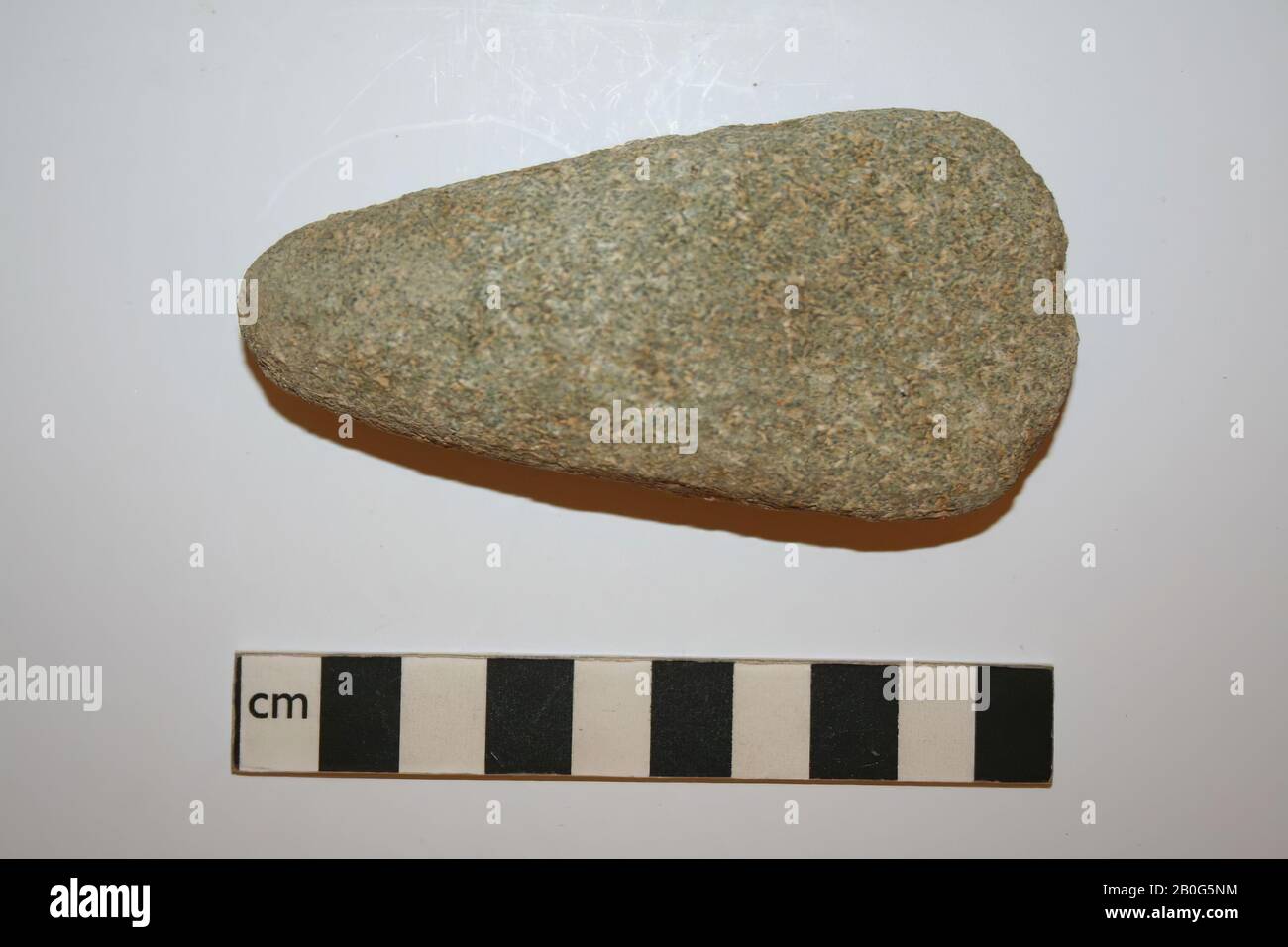 Stone ax, bush hammered with an oval cross section, pointed-pointed ...