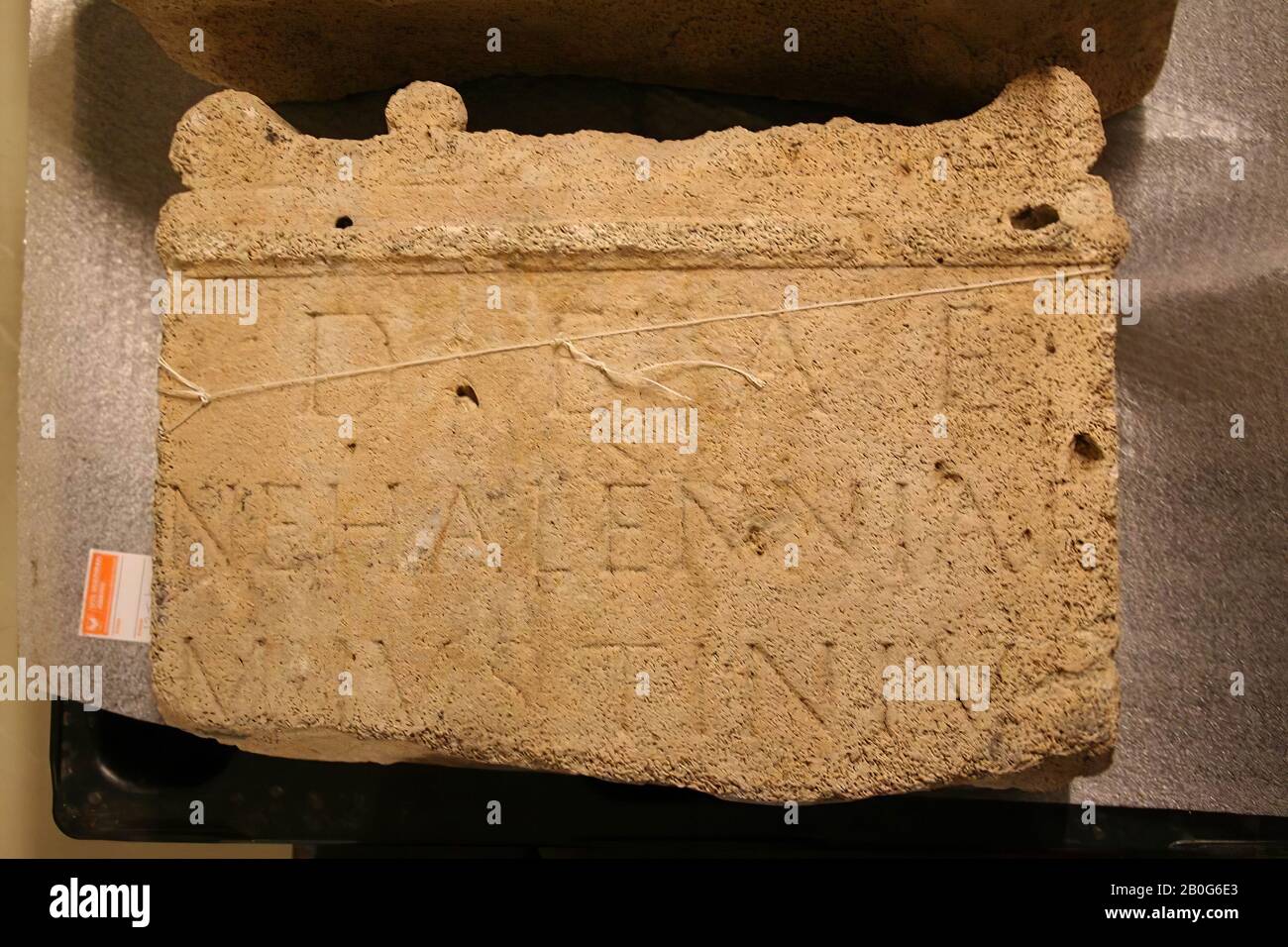 Top part of altar. Limestone. Right side and left side: tree. Backside ...