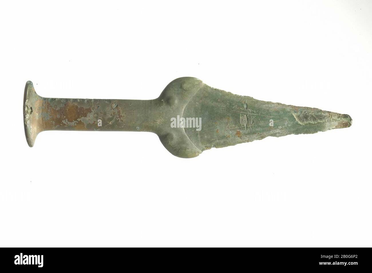 Bronze dagger with handle. The end of the handle is formed by a flat ...