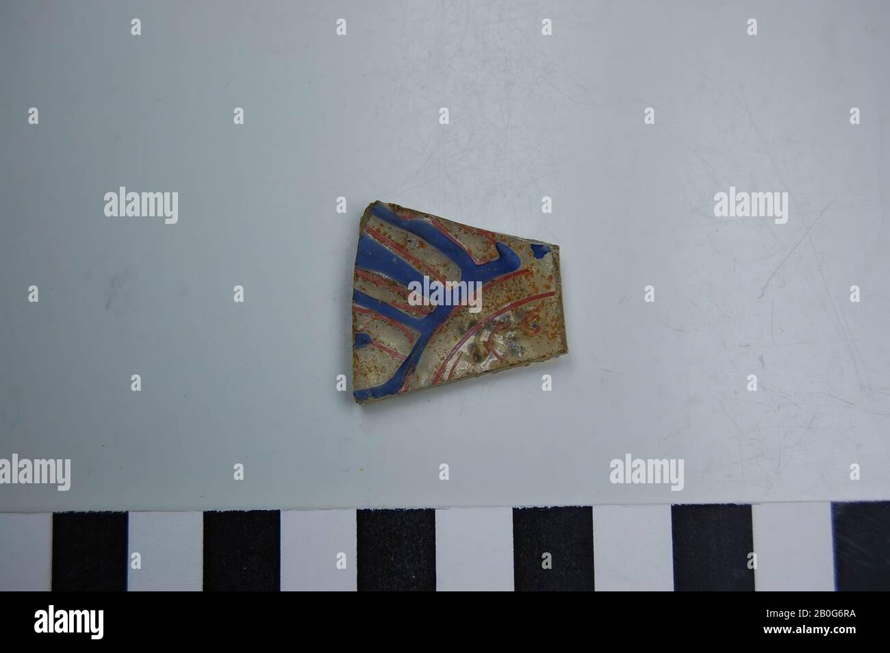 Glass shard of transparent glass, decorated with blue and red., Shard ...