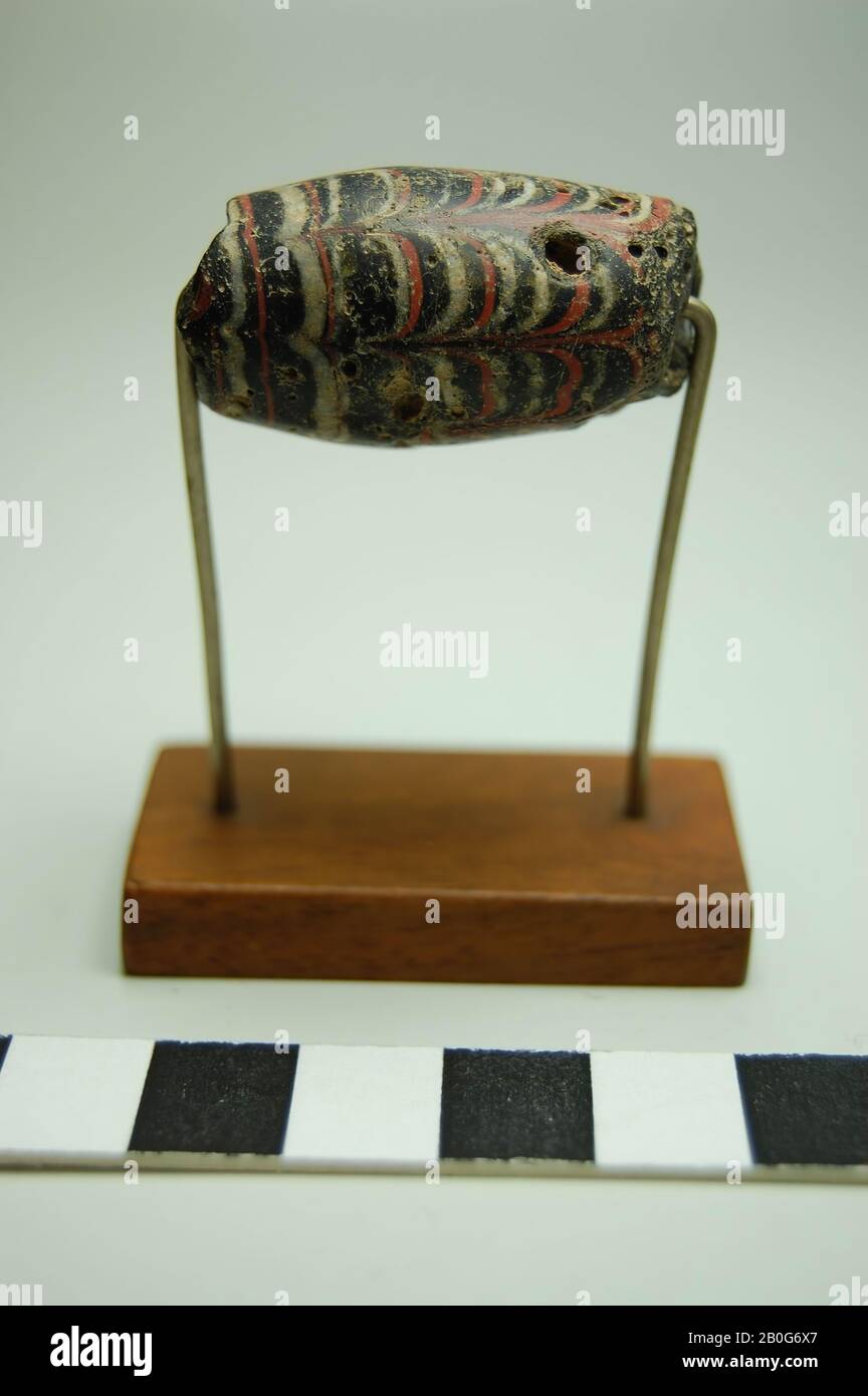 Glass bead with ribs, decorated with zigzag patterns in the colors blue ...