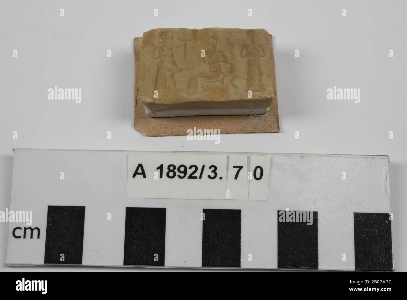 casting, cylinder seal, sulfur, plaster, 2.2 x 3.5 x 1.2 cm, cardboard ...