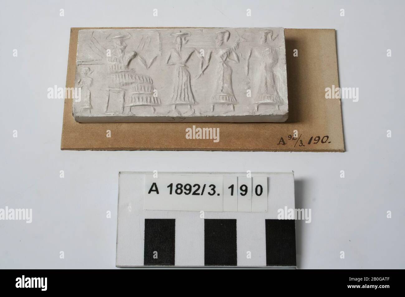 print, cylinder seal, plaster, 3.5 x 7.5 x 0.6 cm, cardboard: 5 x 10 cm ...