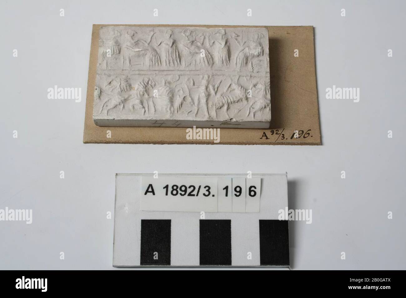 print, cylinder seal, plaster, 3.8 x 6.2 x 0.6 cm, cardboard: 5 x 8.5 ...