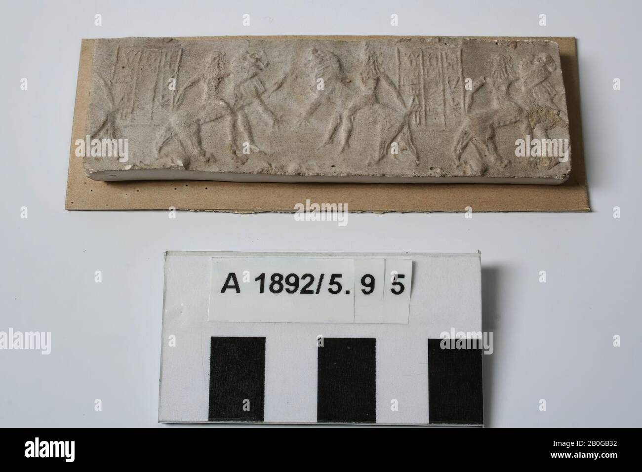 print, cylinder seal, plaster, 2.9 x 9.3 x 0.7 cm, cardboard: 3.9 x 10. ...