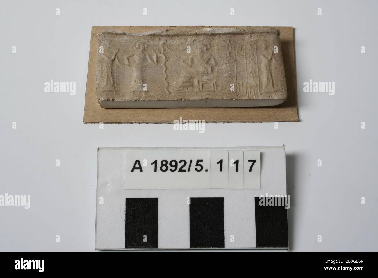 print, cylinder seal, plaster, 2.5 x 6.2 x 0.7 cm, cardboard: 3.6 x 7.1 ...