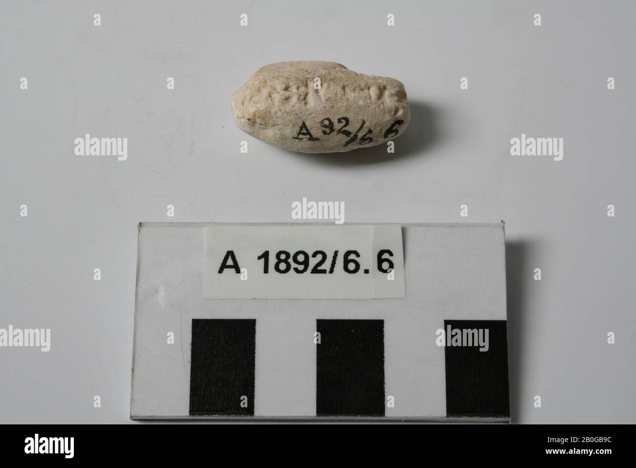 inscription, plaster, L 3 cm, W 1.6 cm, H 1.4 cm Stock Photo - Alamy