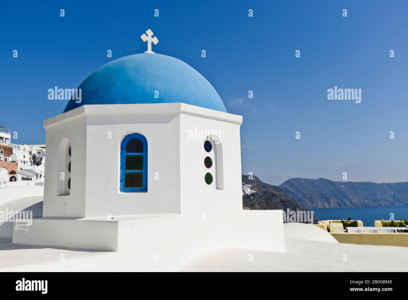 Typical blue dome church in Oia, Santorini island, Greece Stock Photo ...