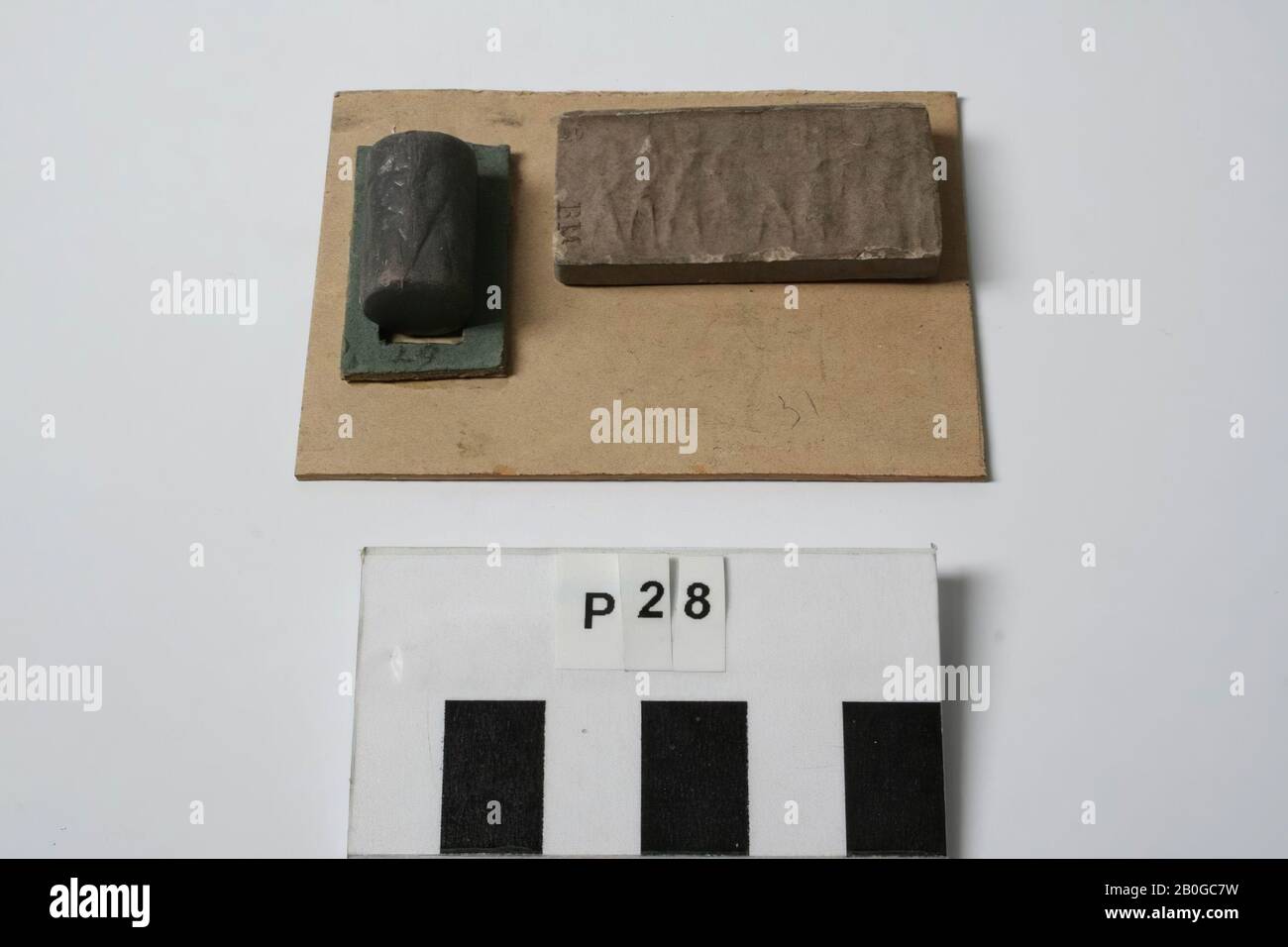 Sulfur casting and imprint of a Persian cylinder stamp from the British ...