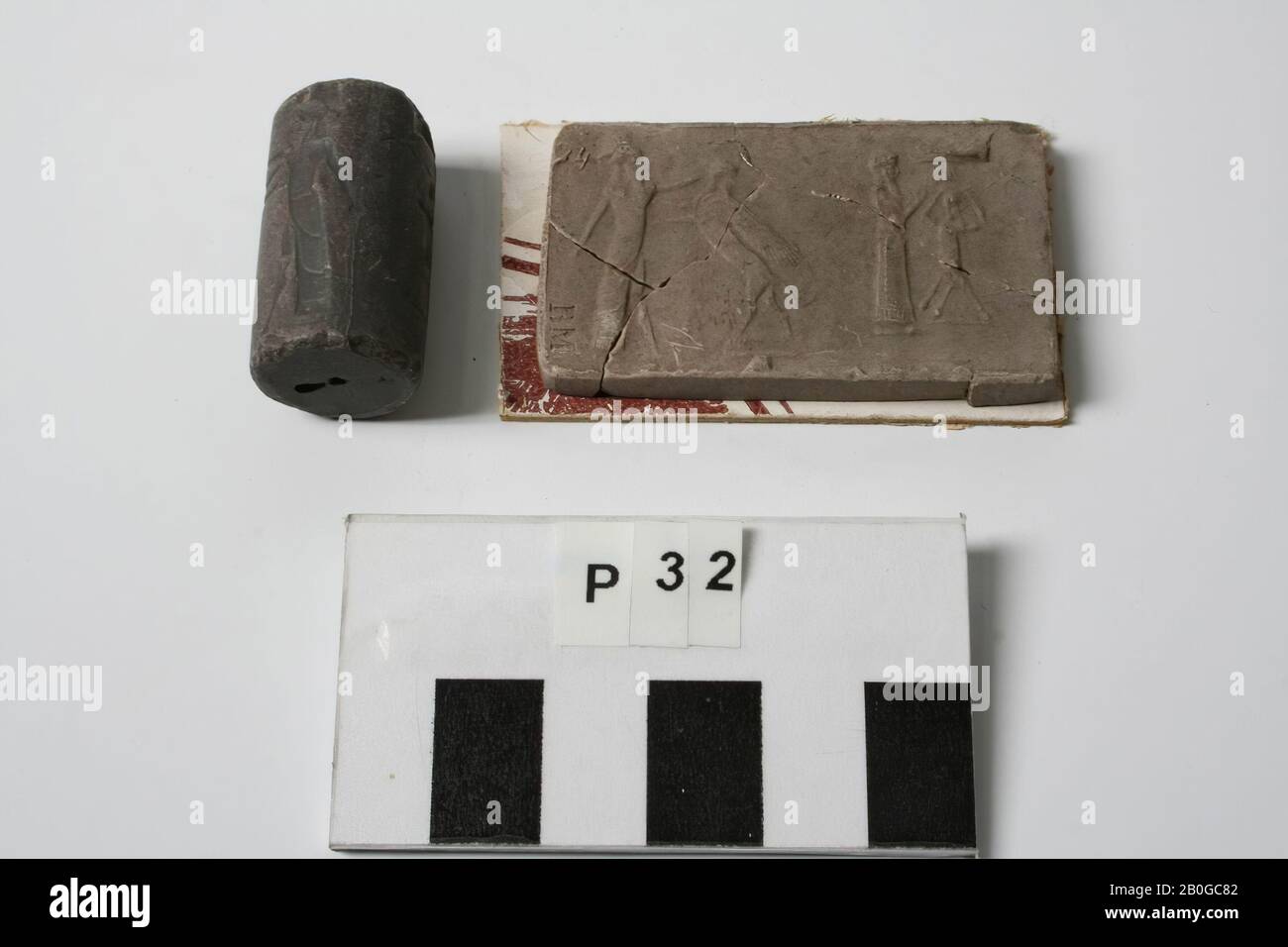 Sulfur casting and imprint of a Persian cylinder stamp from the British ...