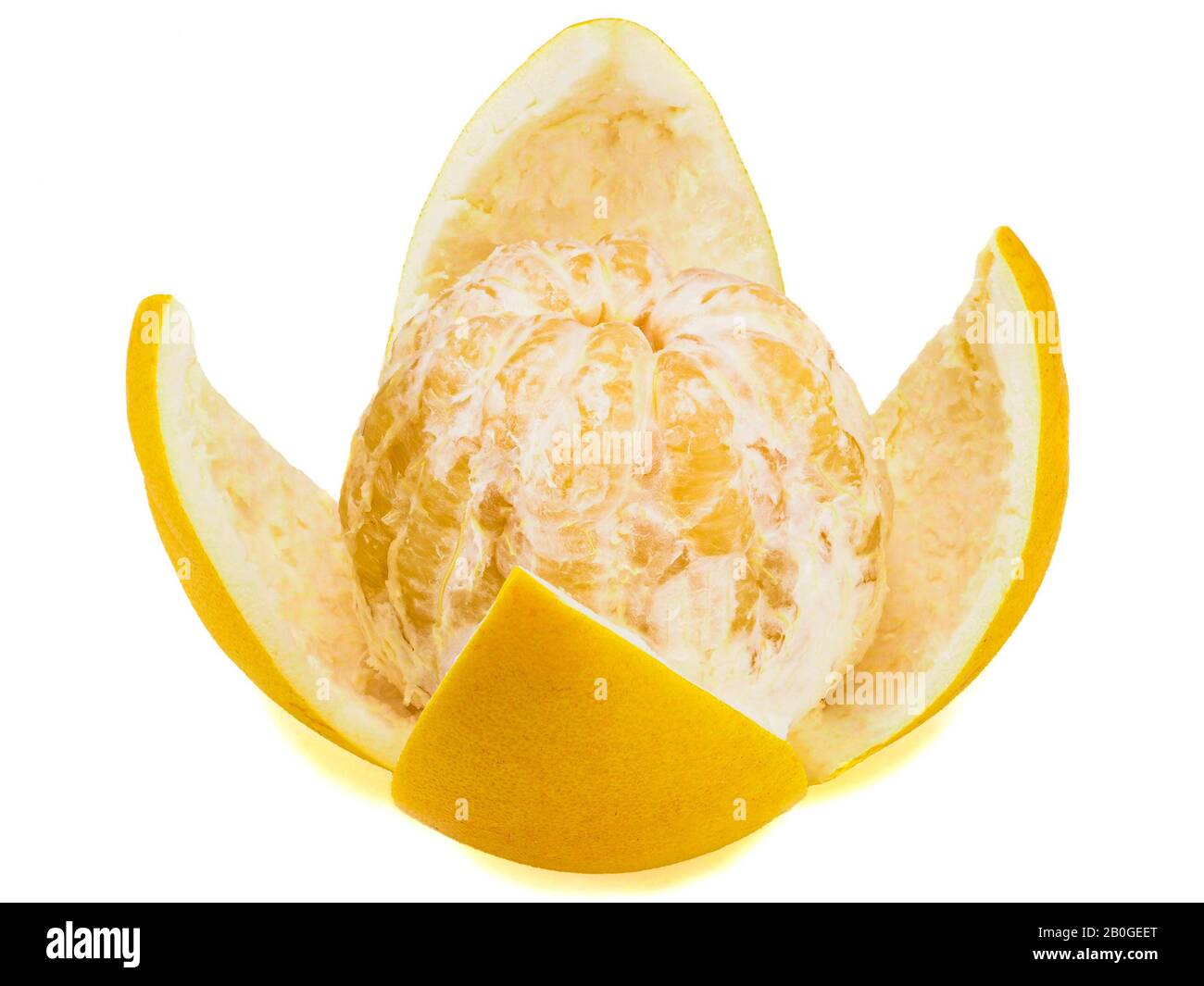 peeled pamelo on a white background Stock Photo - Alamy