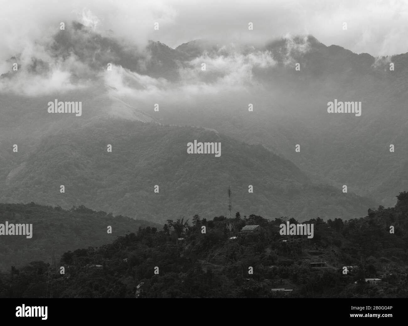 A landscape with the hill station of Haflong in the foreground and the ...