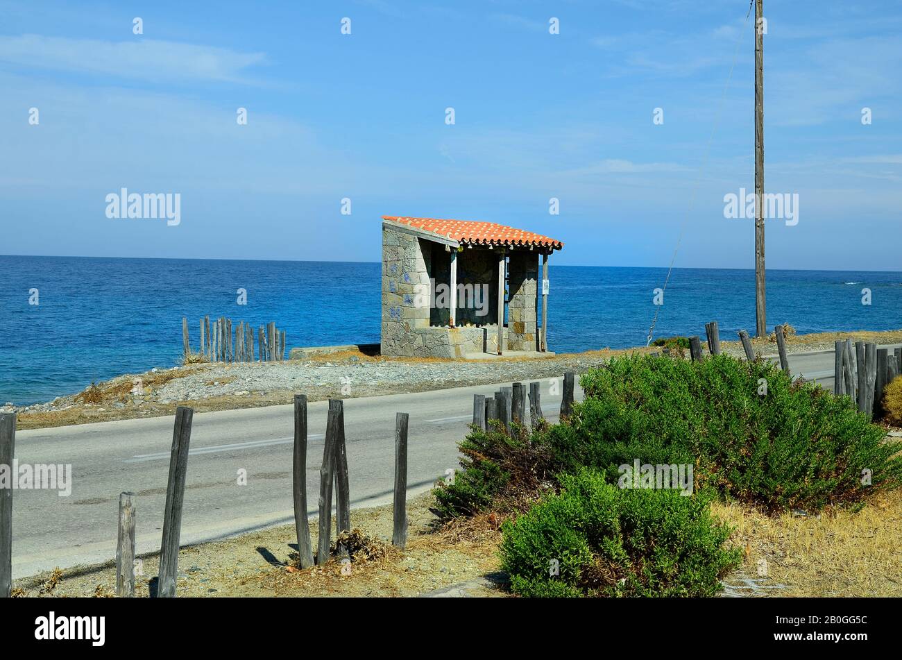 Greece, Samothrace, bus stop on coastal road Stock Photo - Alamy