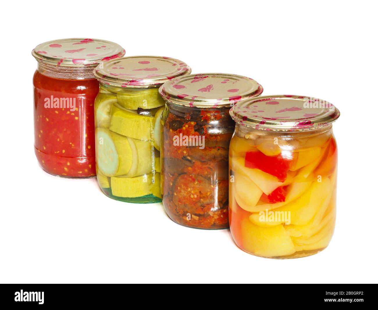 Jars of tasty pickled vegetables on a white background Stock Photo - Alamy