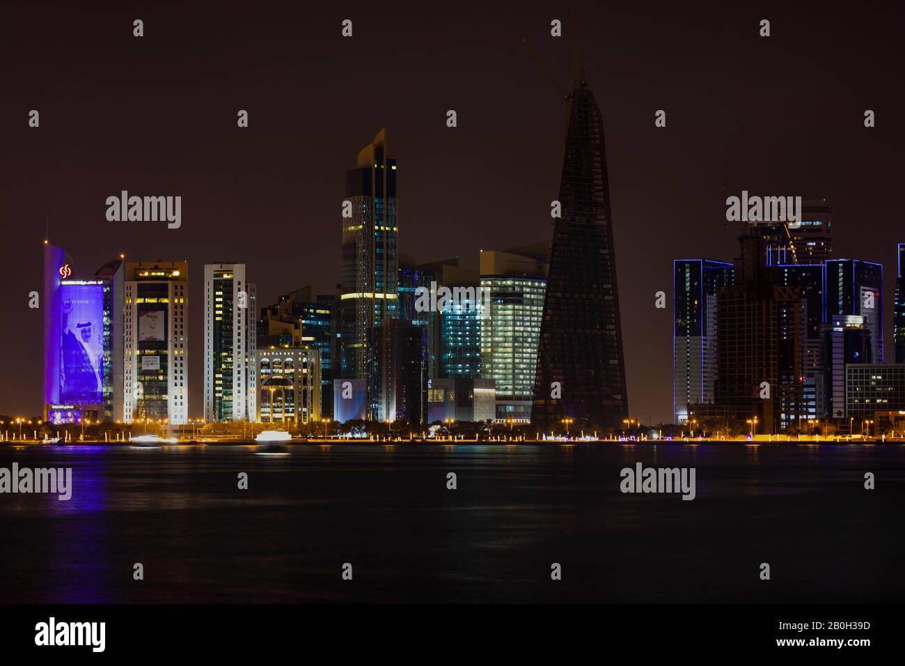 18 Juanuary 2020. Doha city skyline illuminated at night. Qatar, Middle ...