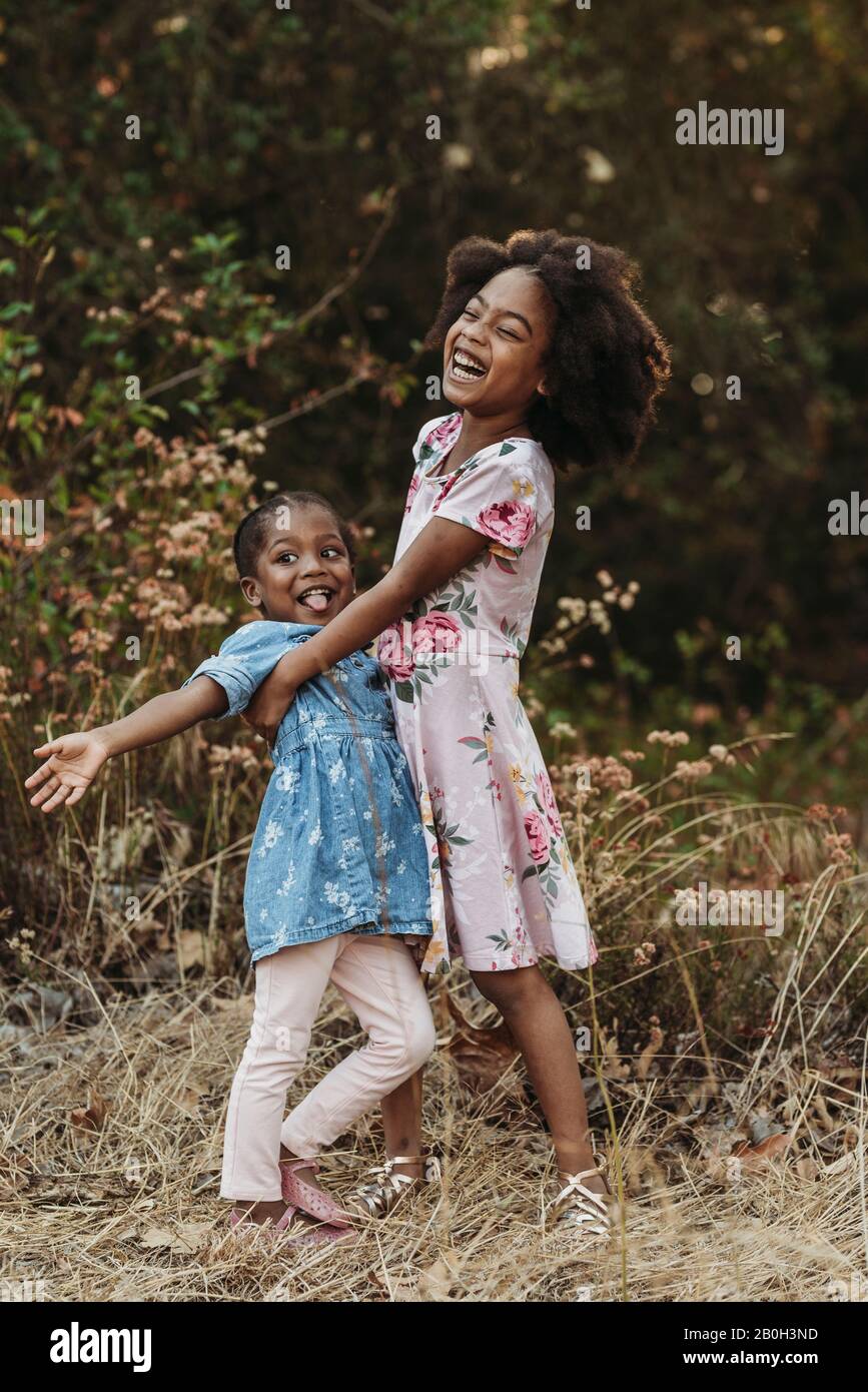 Two children hugging each other hi-res stock photography and images - Alamy