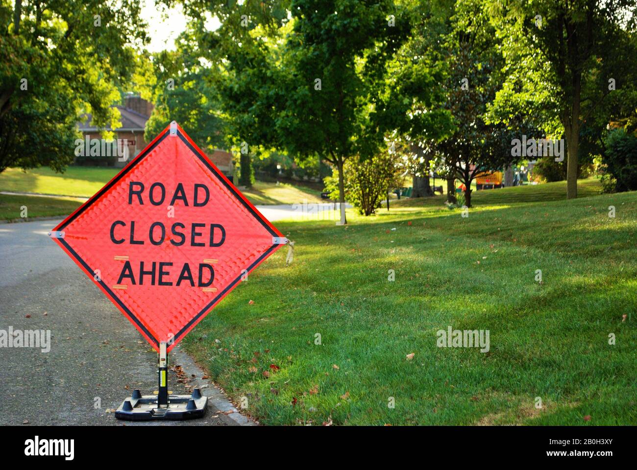 road closed ahead construction sign in a residential neighborhood Stock ...
