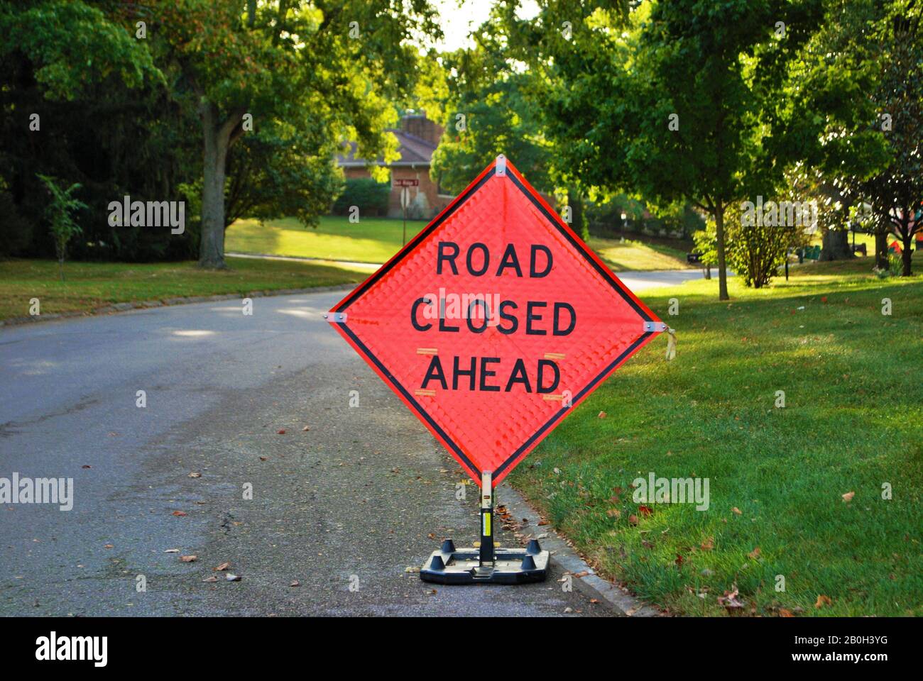 road closed ahead construction sign in a residential neighborhood Stock ...