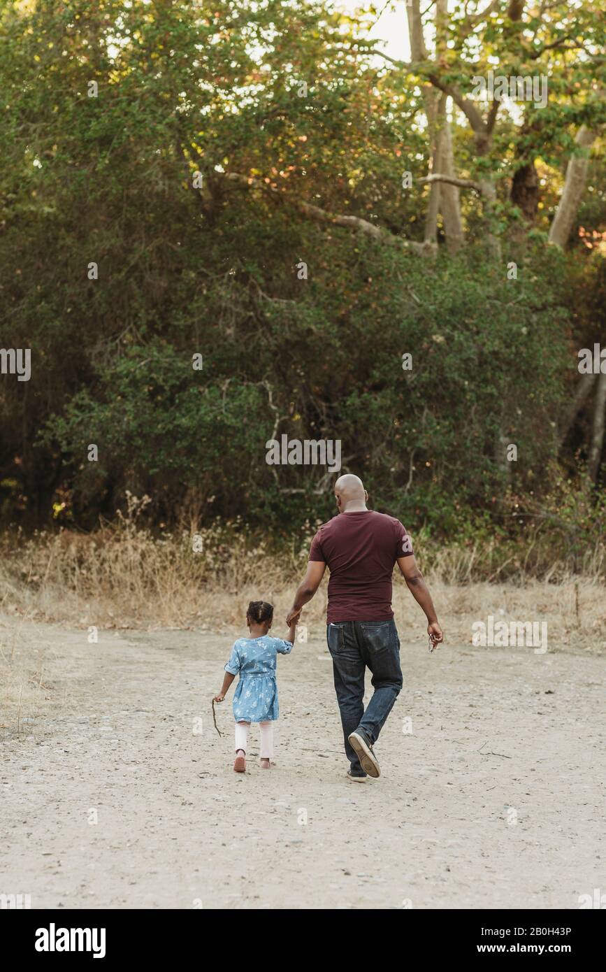 Father holding daughters hand hi-res stock photography and images - Alamy