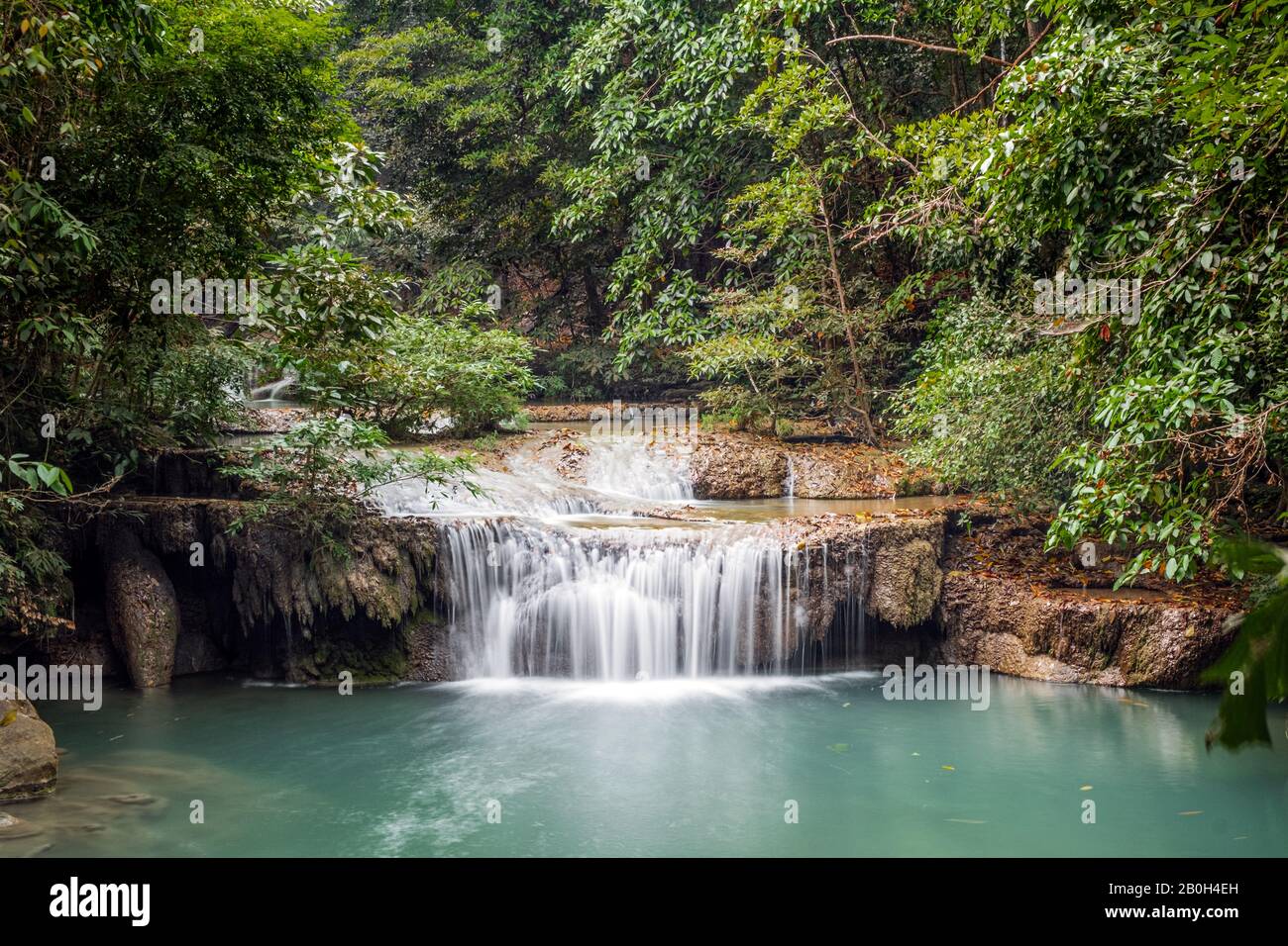 Waterfall in national park in jungle, long exposure, in Kanchanaburi ...