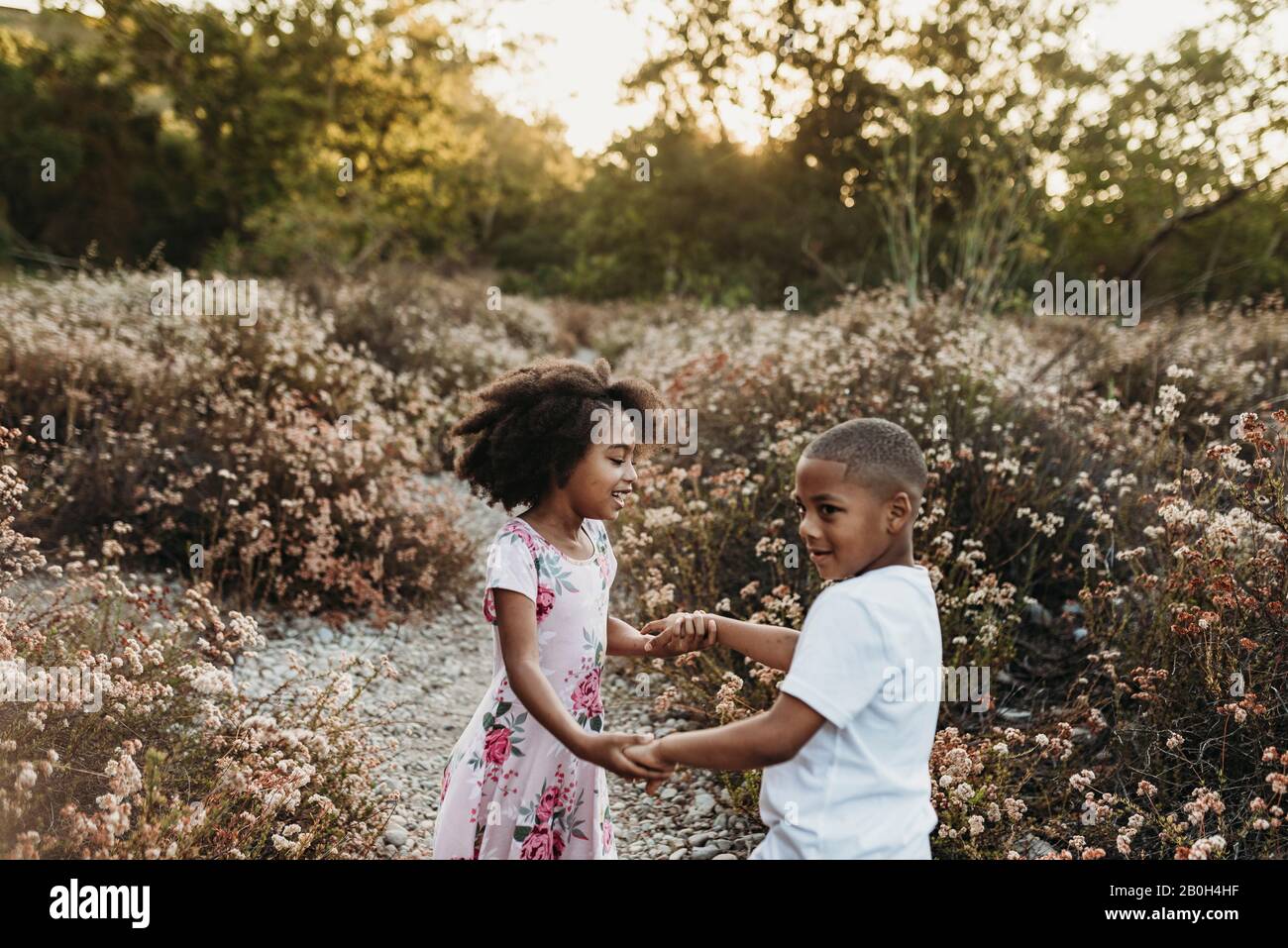Little Sisters Holding Hands