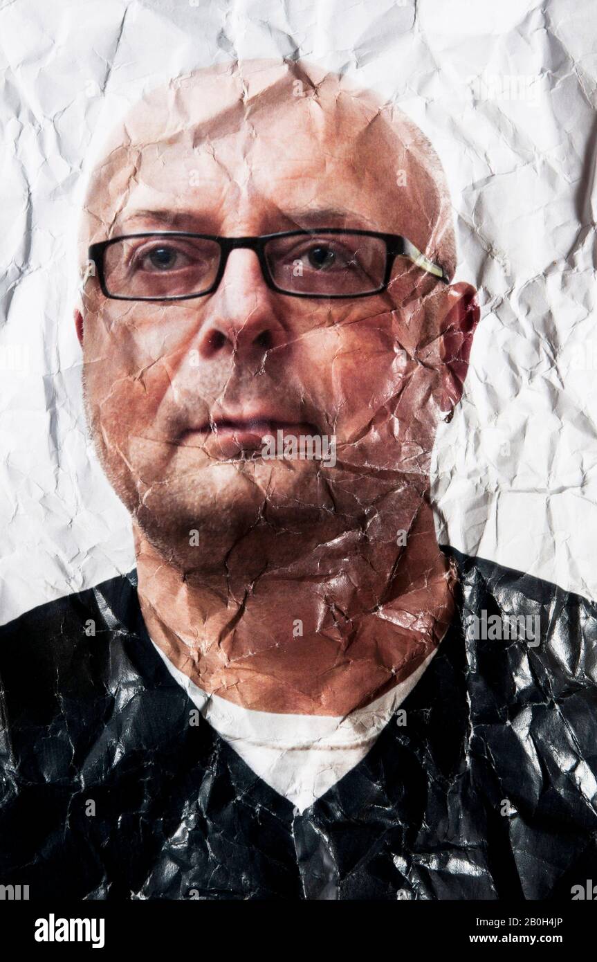 man portrait printed on paper and crumpled - ageing concept Stock Photo ...