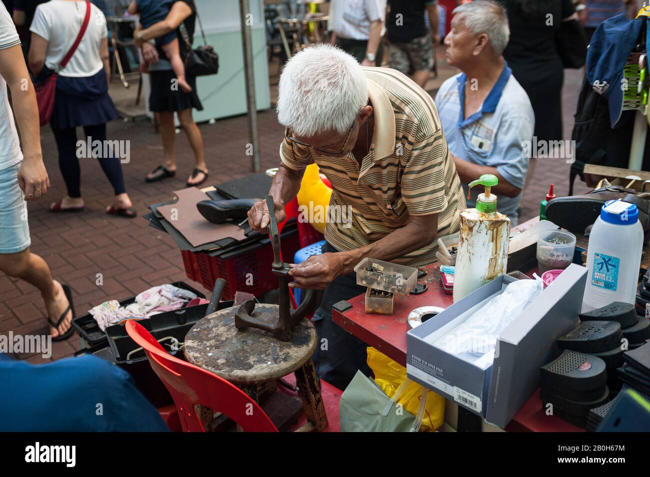 Shoe repair stall hi-res stock photography and images - Alamy