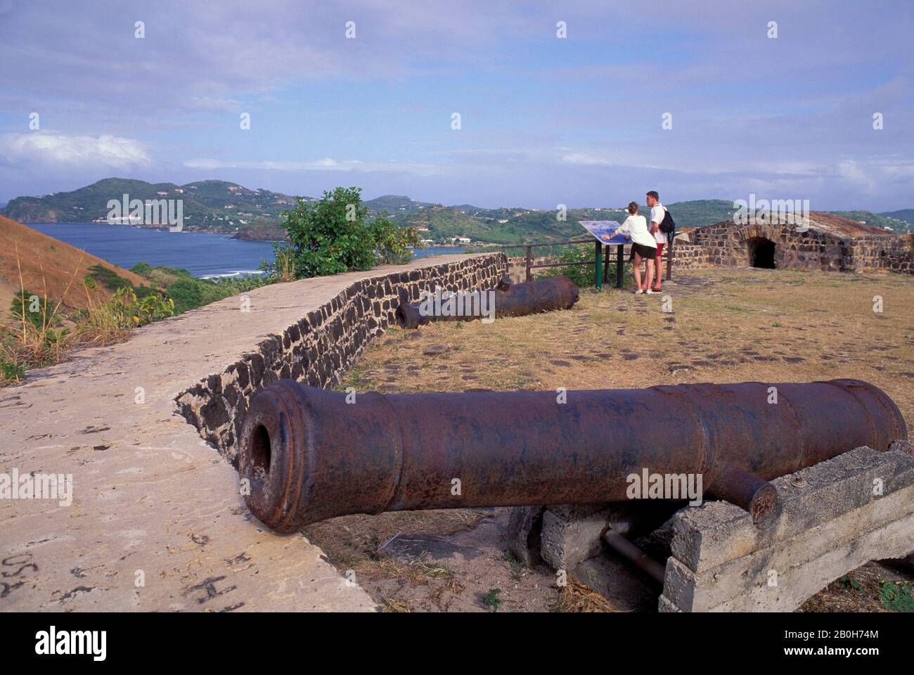 ST. LUCIA, RODNEY BAY, FORT RODNEY, TOURISTS LOOKING AT INTERPRETIVE ...