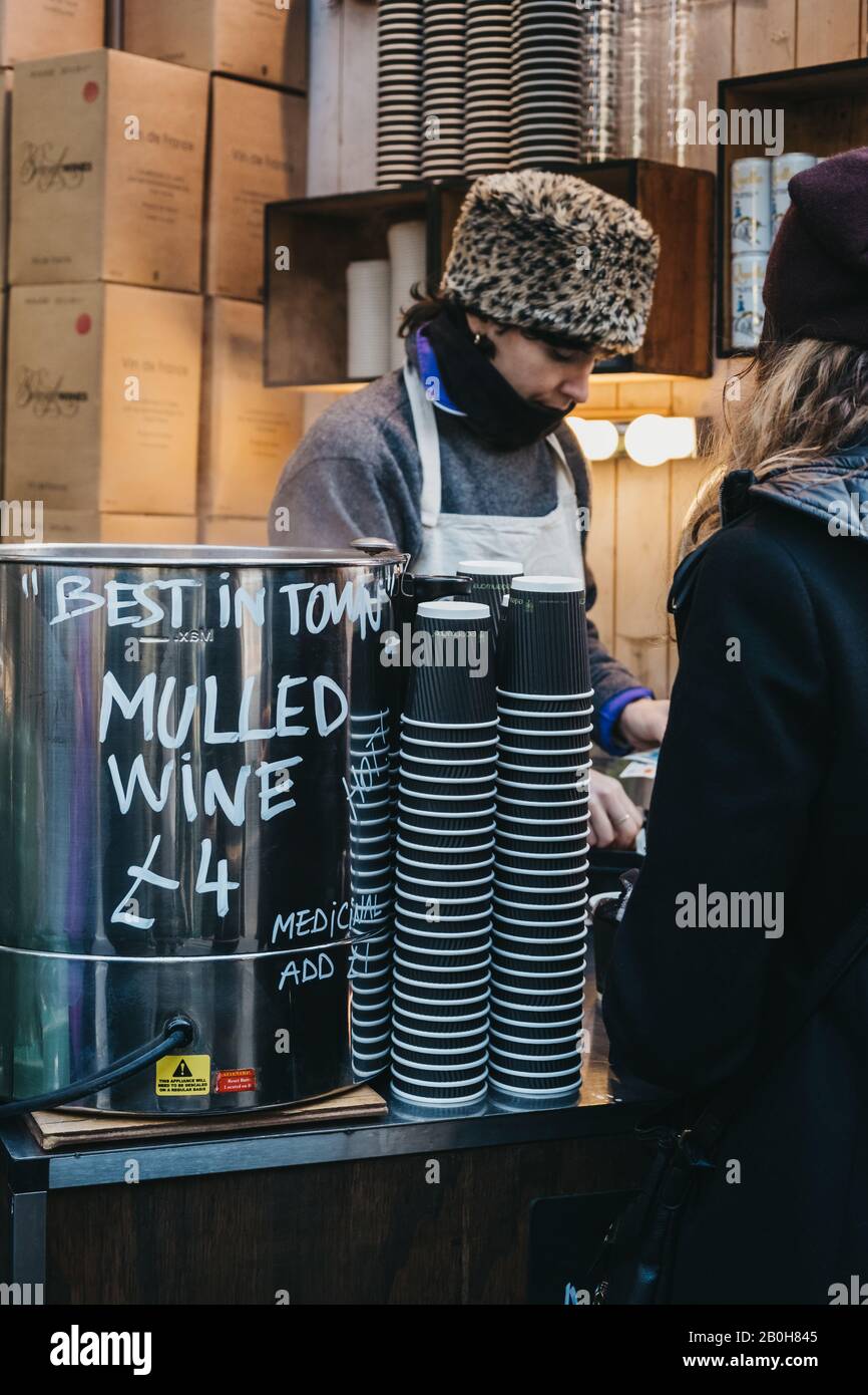 London, UK - November 29, 2019: Mulled wine on sale at a drinks stall ...