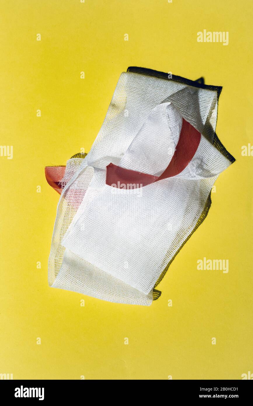 Bandage with tape on yellow. Top view Stock Photo - Alamy