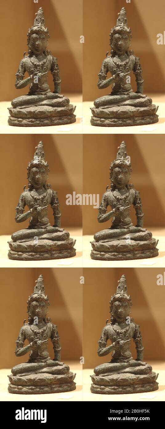 Seated male deity holding a manuscript hi-res stock photography and ...