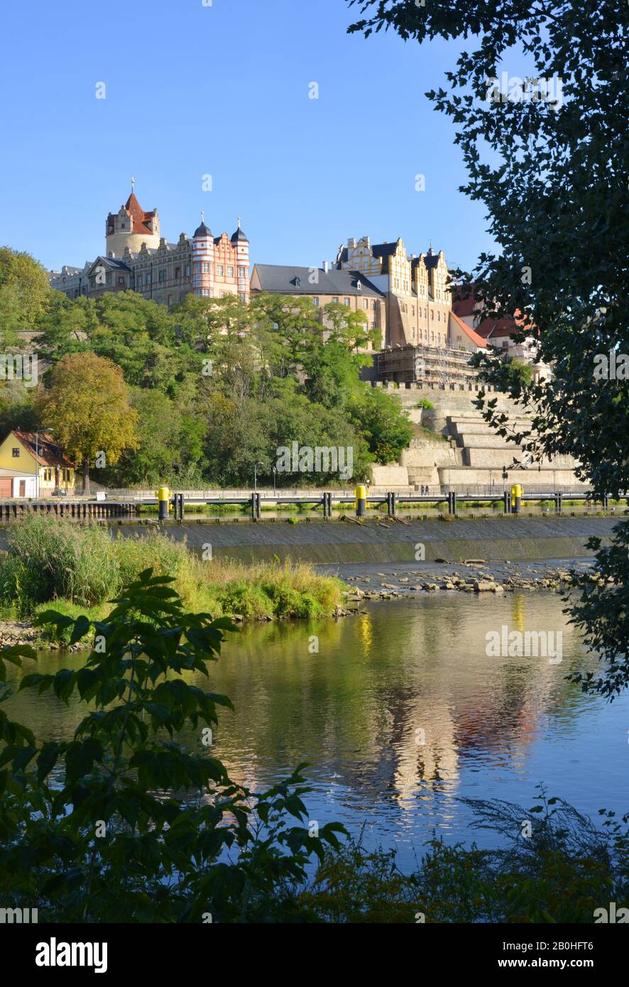 Bernburg, Germany view over the Saale river to the historical castle ...