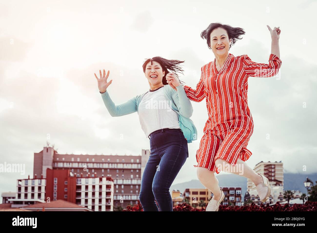 Japanese women jumping for hi-res stock photography and images - Alamy