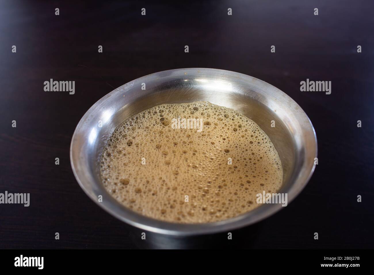 View of filter coffee in a stainless steel tumbler. Chennai is famous ...