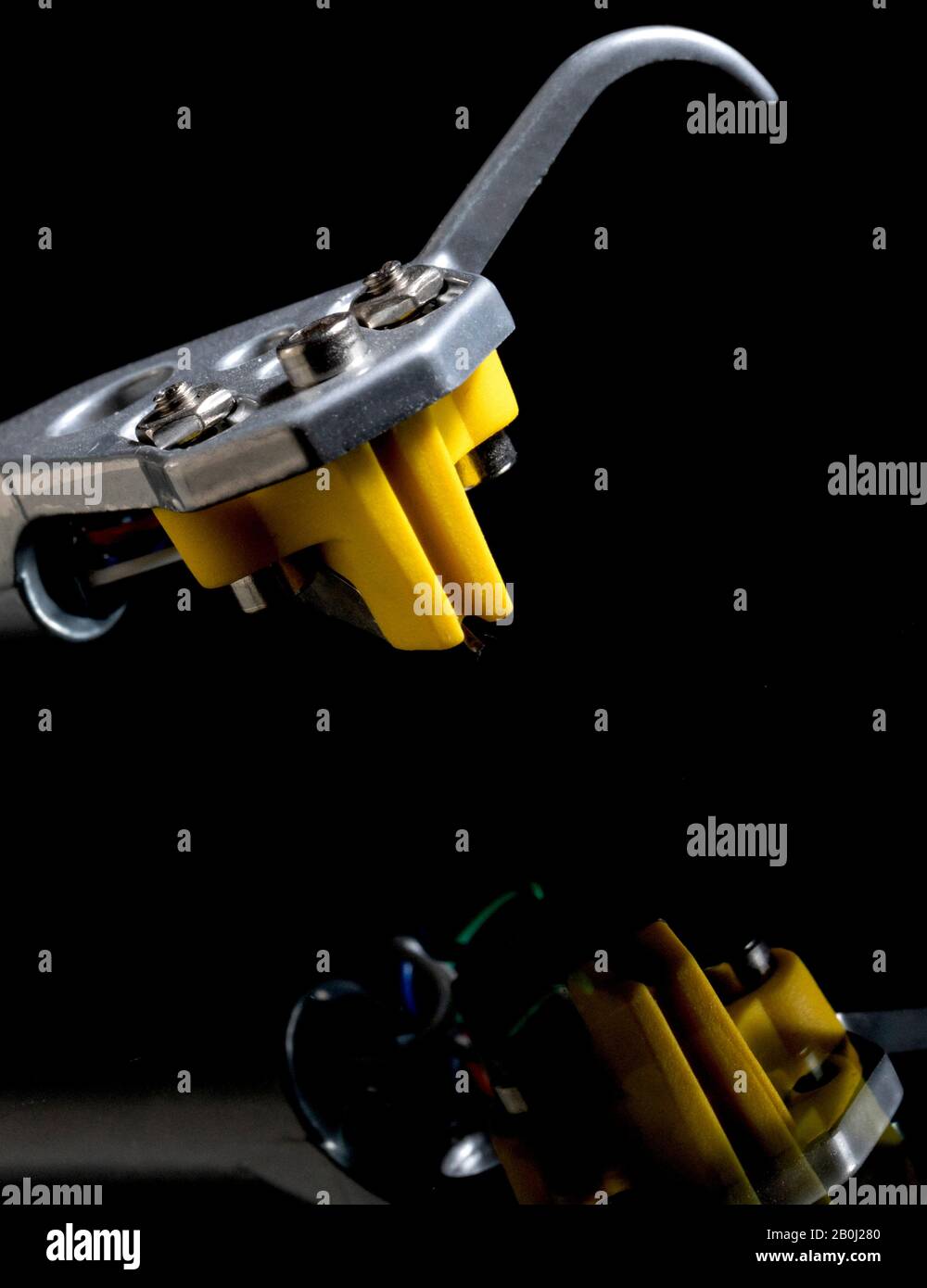 Turntable arm closeup on black background Stock Photo - Alamy