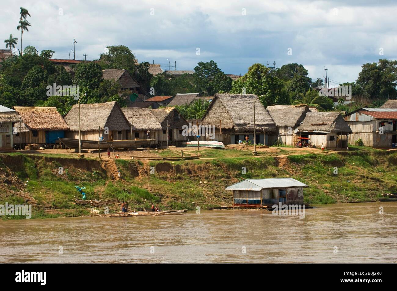 PERU, AMAZON BASIN, MARANON RIVER, TOWN OF NAUTA, THATCHED HUTS Stock ...