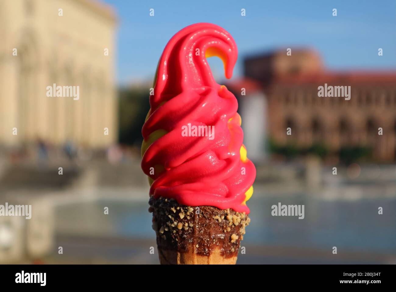 Vibrant Red Raspberry Soft Serve Ice Cream Cone Against Blurry Sunny ...