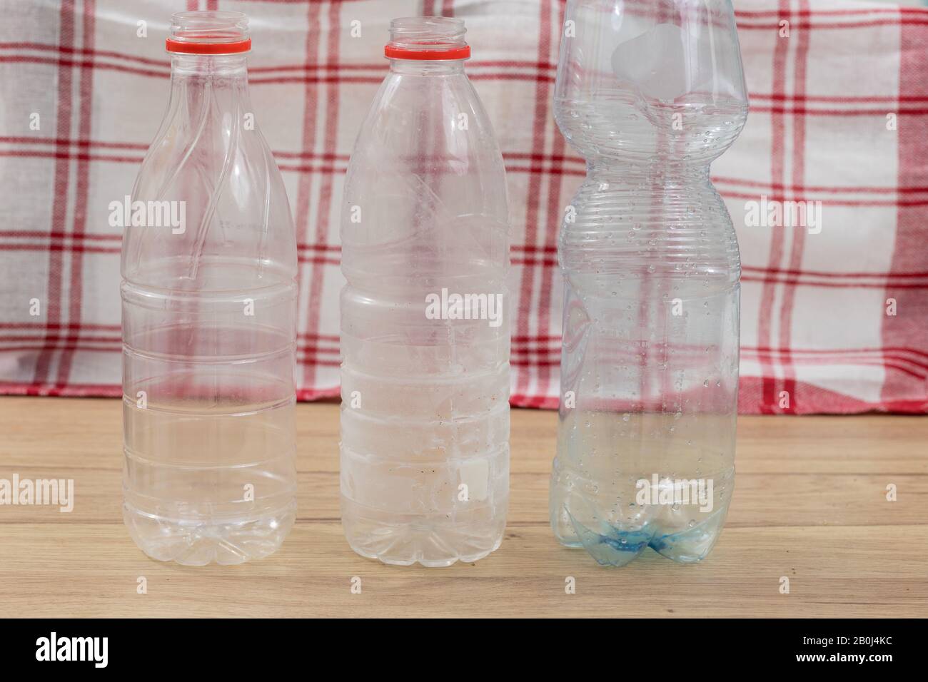 Empty, unnecessary plastic bottles. The concept of deliberately ...