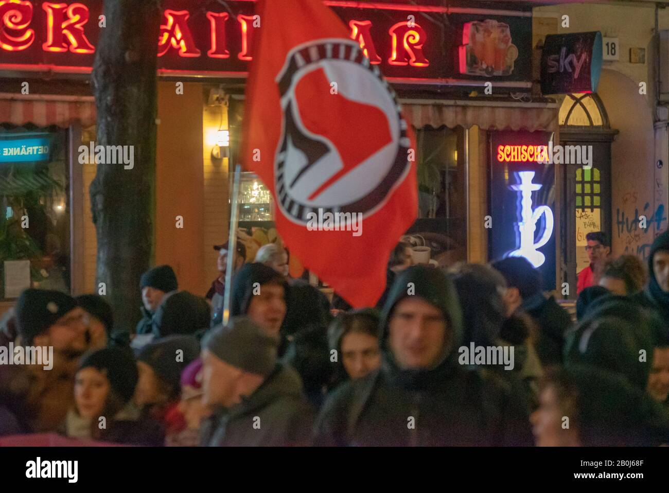 Berlin, Germany. 20th Feb 2020. An antifa (anti-fascist) flag is held ...