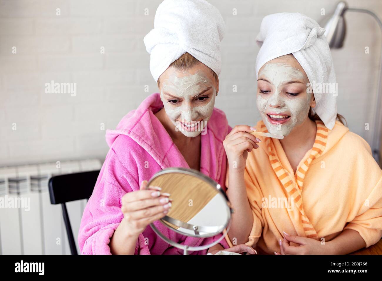 Kid mom facial mask hi-res stock photography and images - Alamy
