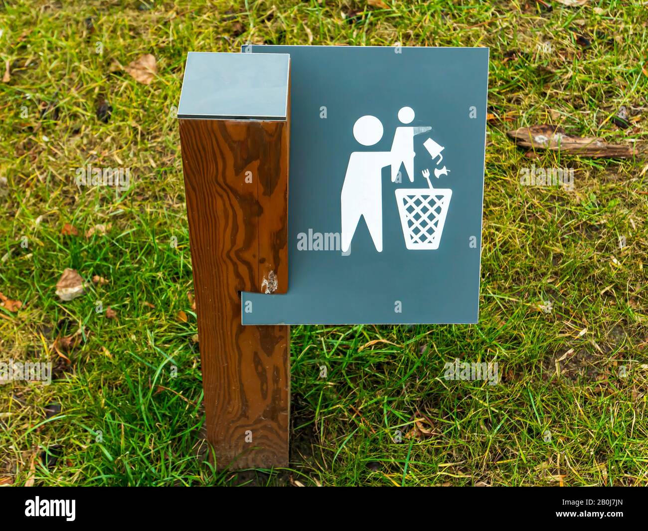A warning sign about the rules of conduct in a public park Stock Photo ...