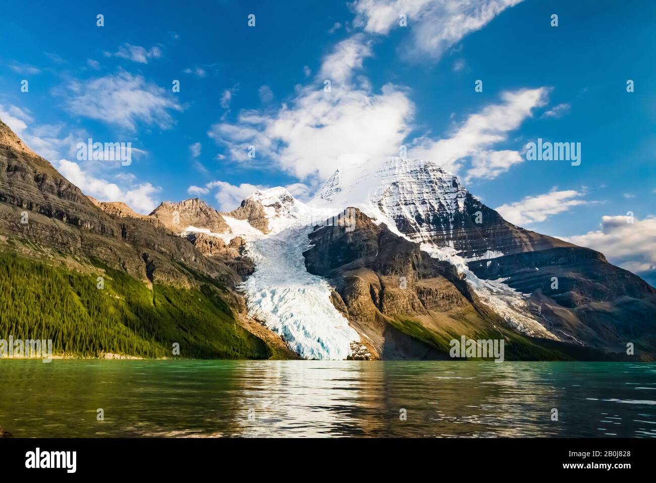 Berg Lake with Berg Glacier and the towering presence of Mount Robson ...