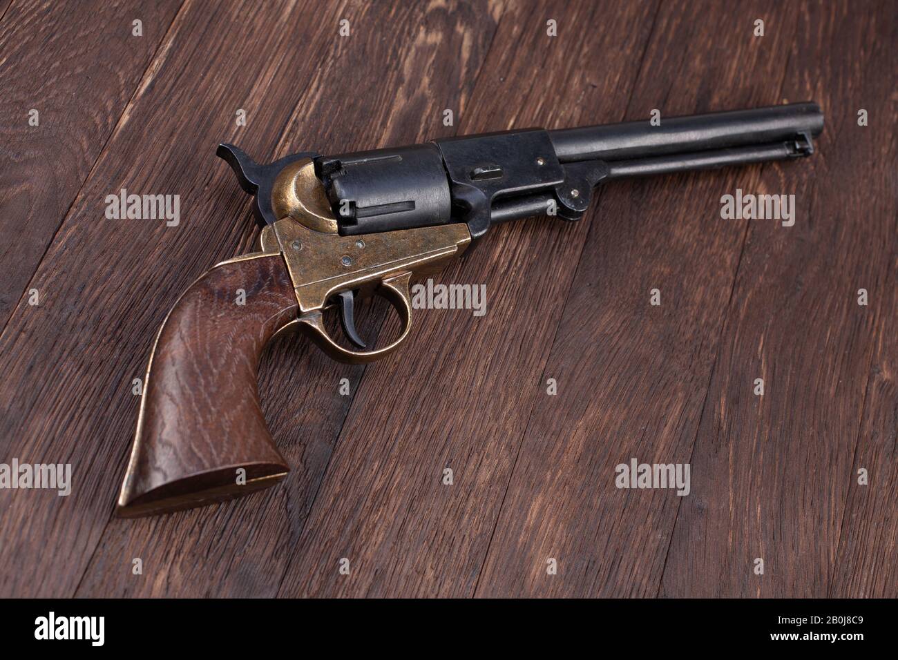Firearms of the Old West - Percussion Army Revolver on wooden table ...