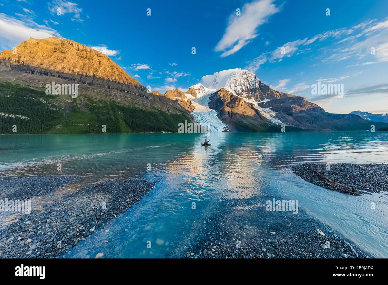 Berg Lake with Berg Glacier and the towering presence of Mount Robson ...