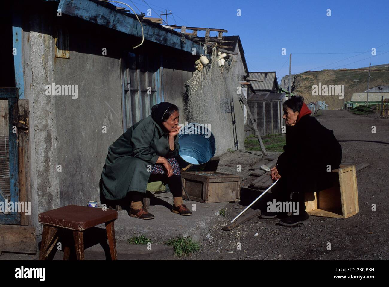 RUSSIA, MAGADAN REGION, UELEN, STREET SCENE WITH TWO OLD INUIT (ESKIMO ...