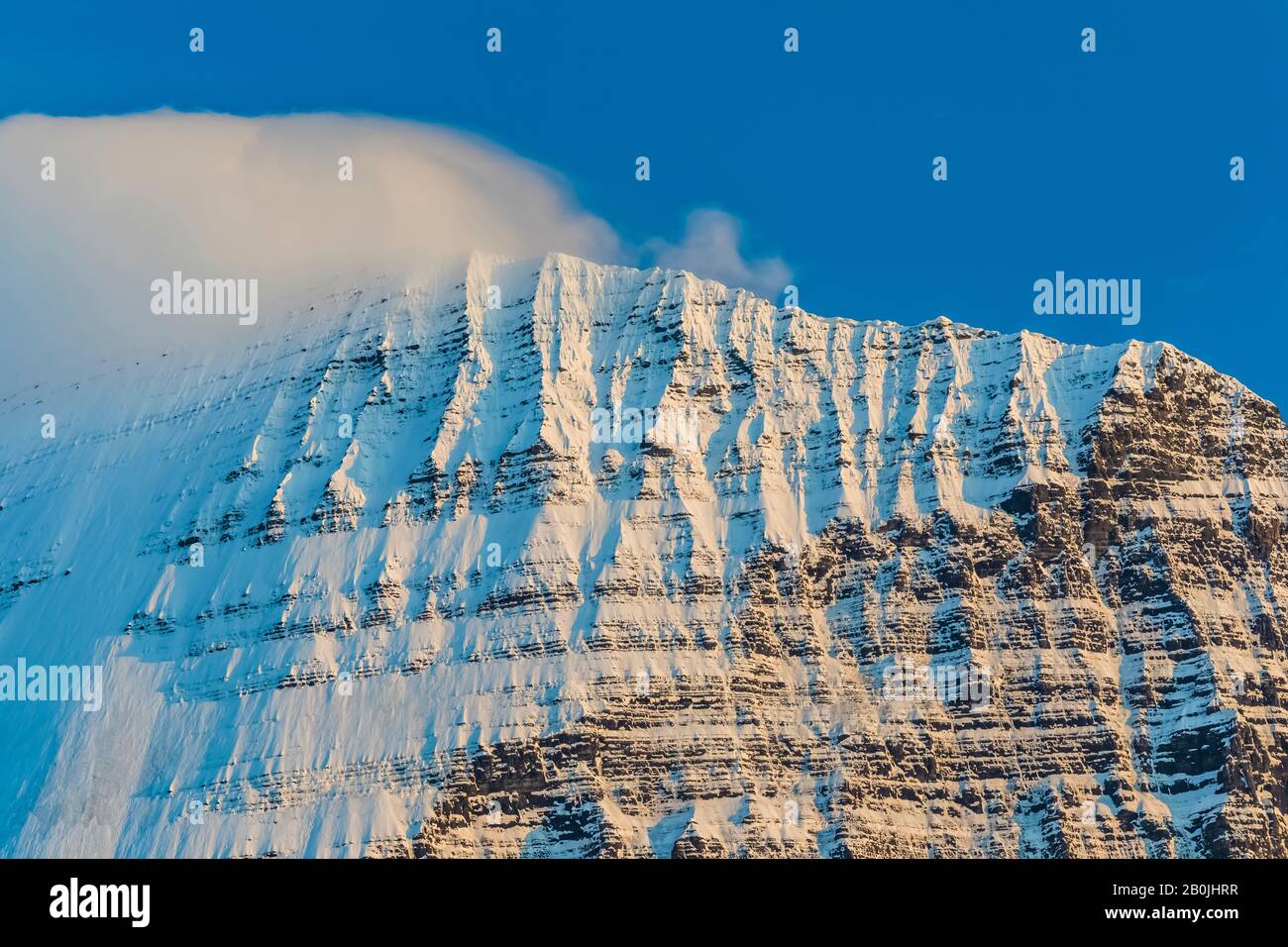 Dramatic evening light on Mount Robson in Mount Robson Provincial Park ...