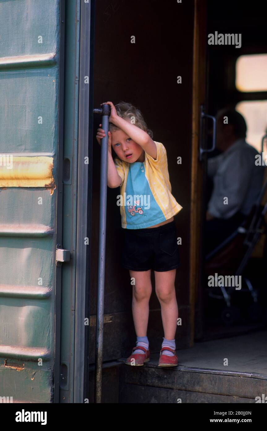 RUSSIA, PERM RAILWAY STATION SCENE, BOY IN TRAIN Stock Photo - Alamy